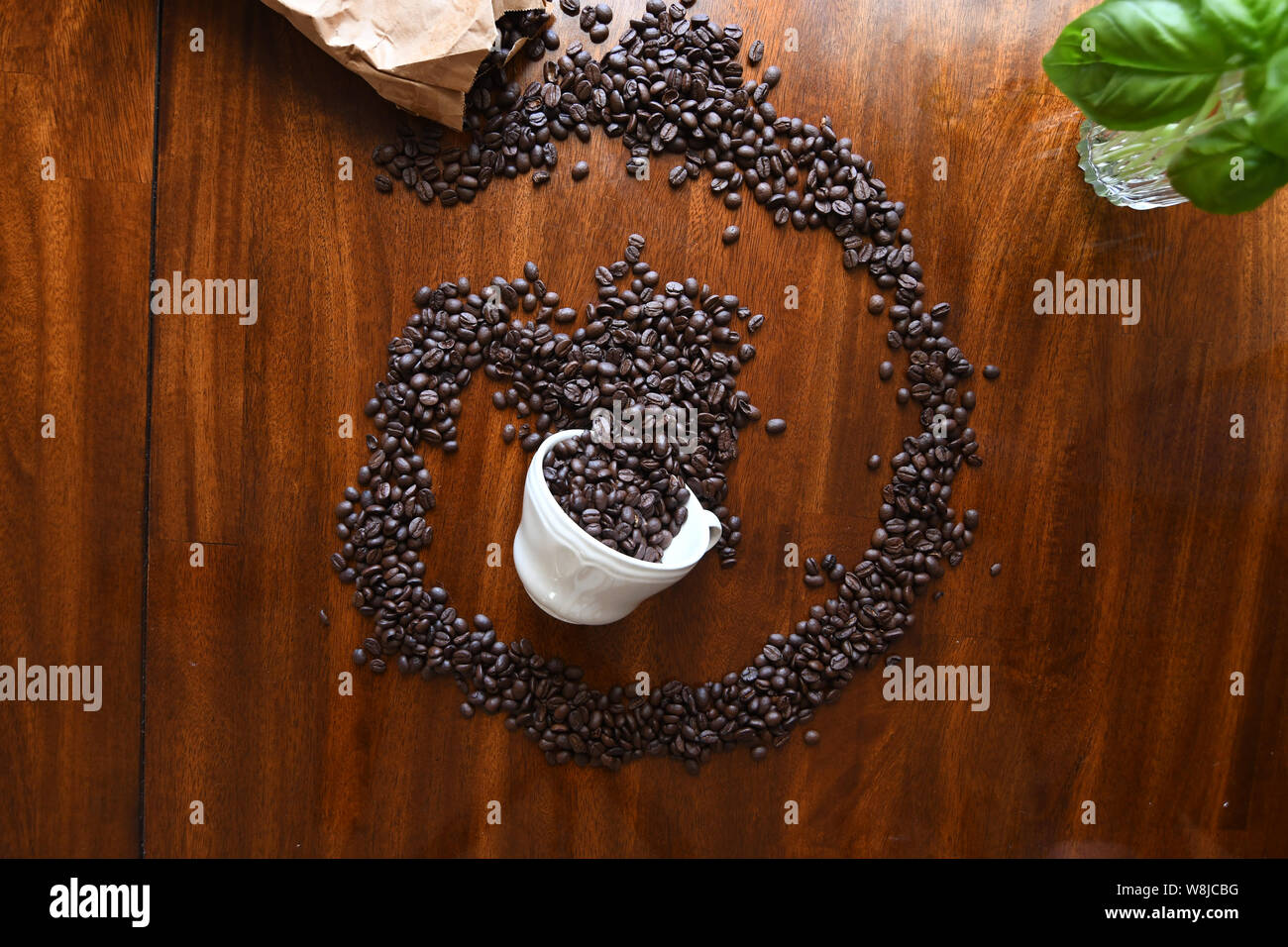 Home made coffee with coffee beans in a swirl pattern Stock Photo - Alamy