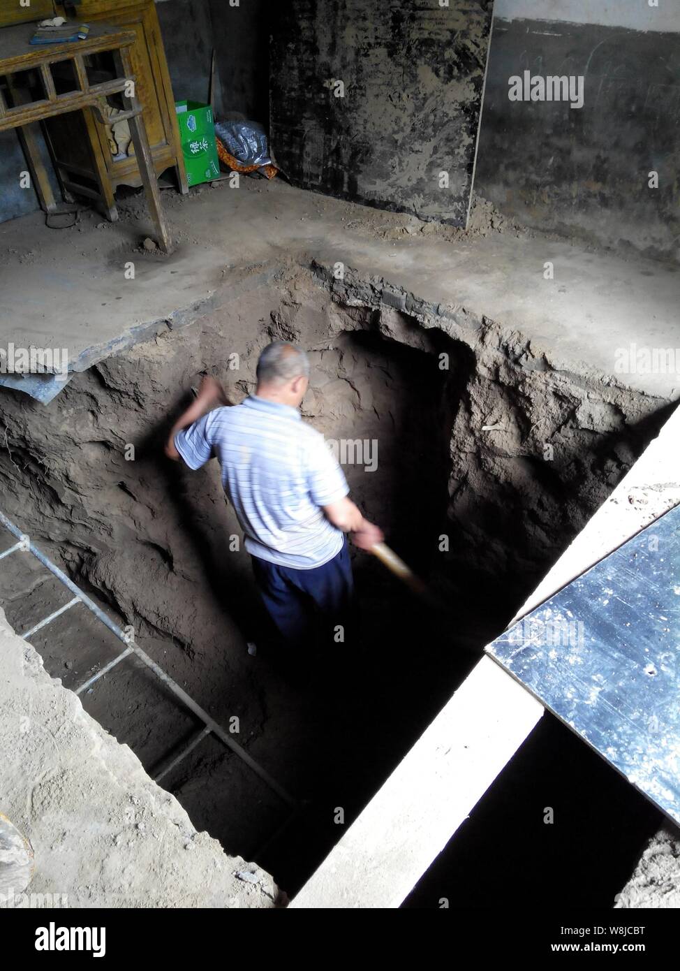 The man, who dug a 3-meter hole in his living room to unearth a deposit ...