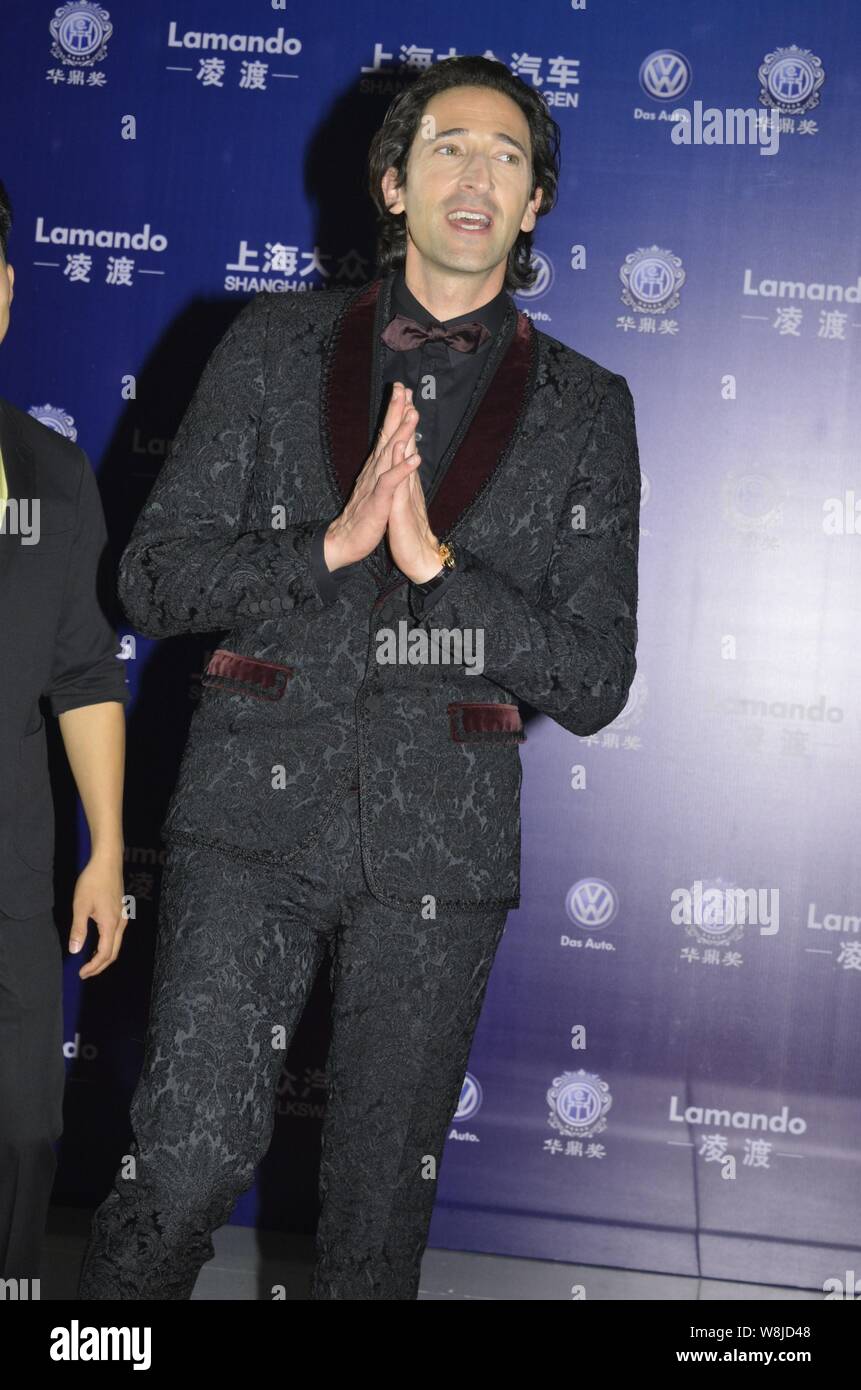 American actor Adrien Brody poses on the red carpet for the 16th ... American actor Adrien Brody poses on the red carpet for the 16th ...