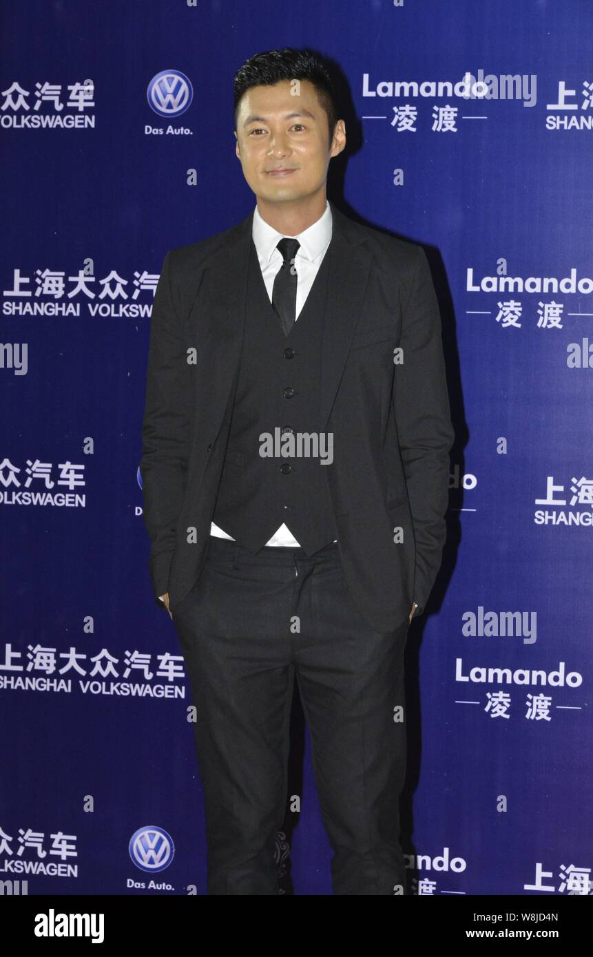 Hong Kong singer and actor Shawn Yue poses on the red carpet for the ...