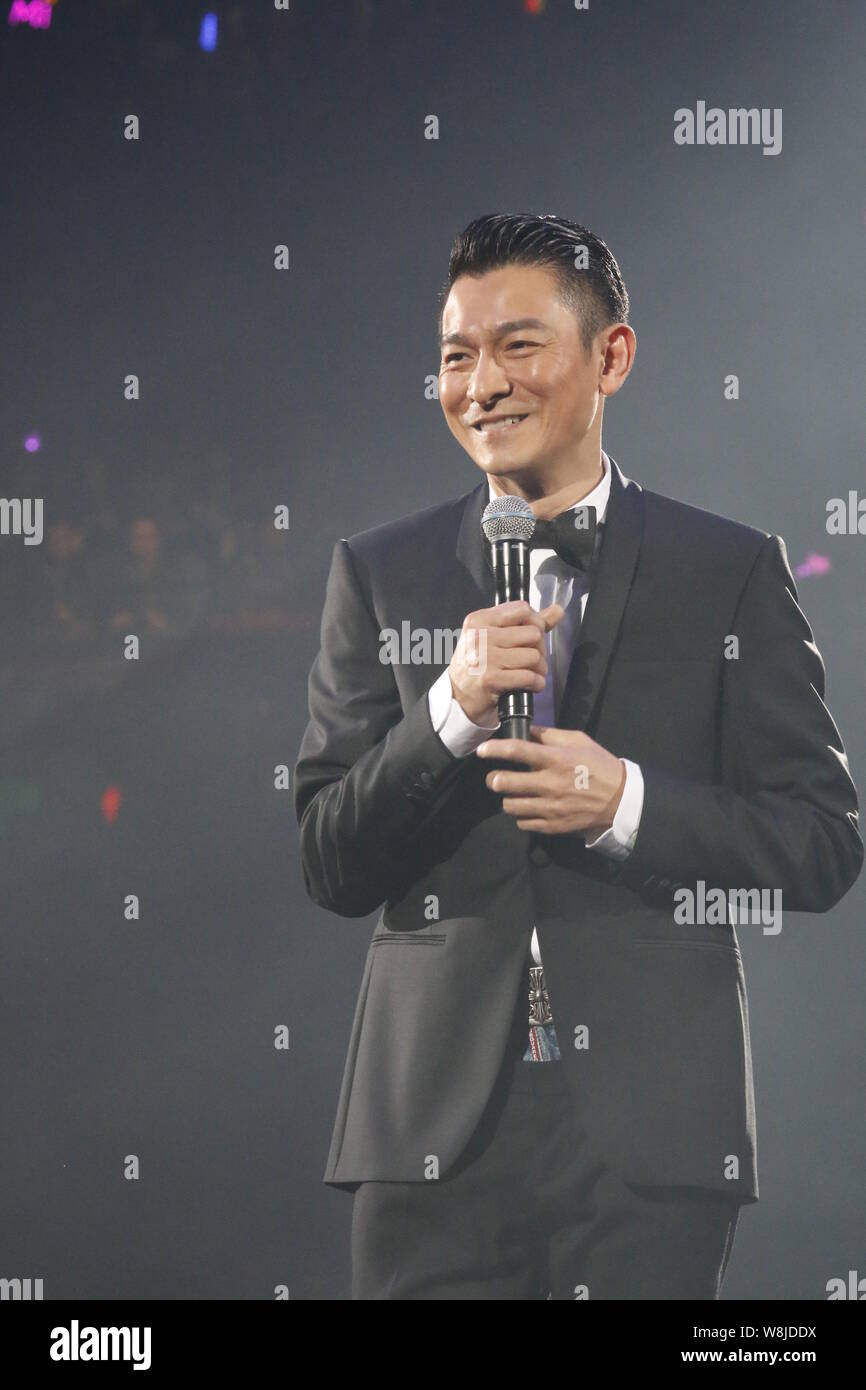 Hong Kong actor and singer Andy Lau smiles during singer Sammi Cheng's concert in Hong Kong ...