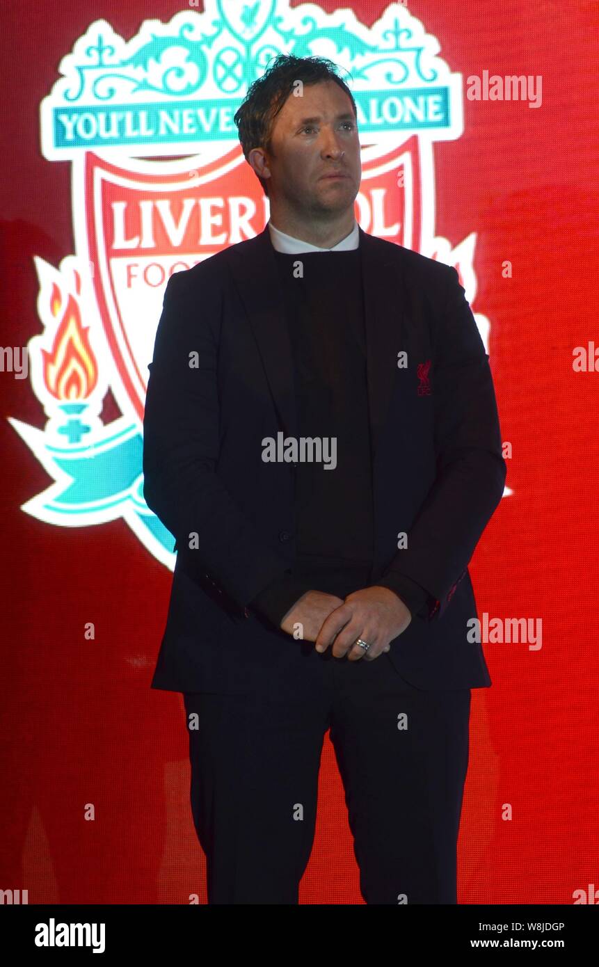 Retired English soccer player Robbie Fowler poses at a fan meeting ...