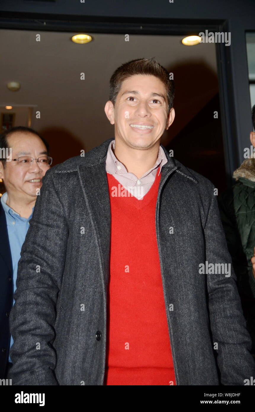Argentine football star Dario Conca, front, poses with smiles as he ...