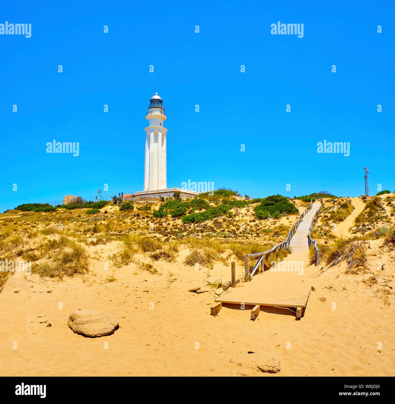 Wooden walkway going to Faro de Trafalgar Lighthouse, in The Cabo de ...