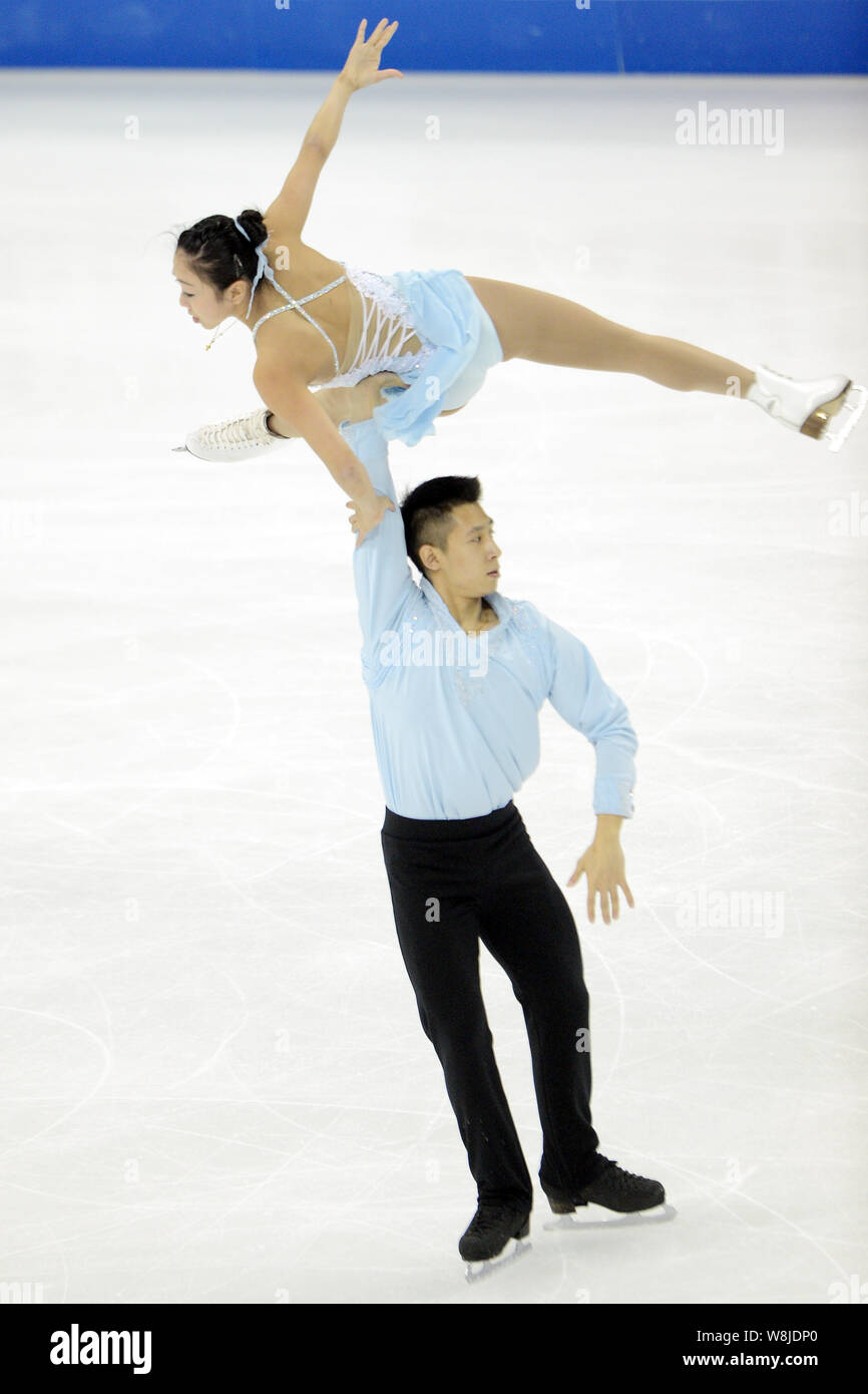 Sui Wenjing, top, and Han Cong of China perform during the Pairs Free ...