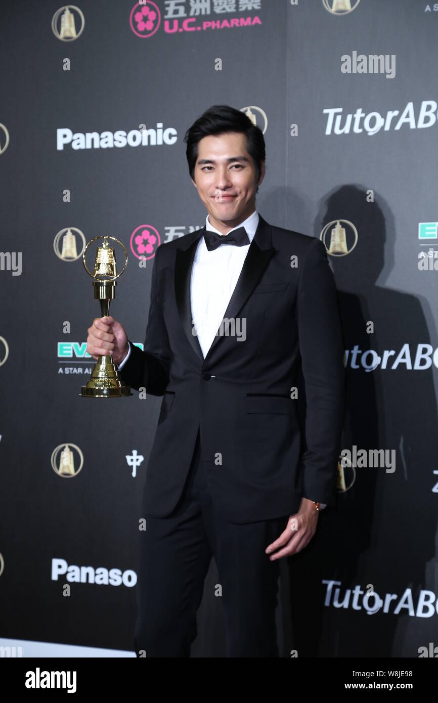 Taiwanese actor Lan Cheng Long holds his trophy of the Best Leading ...