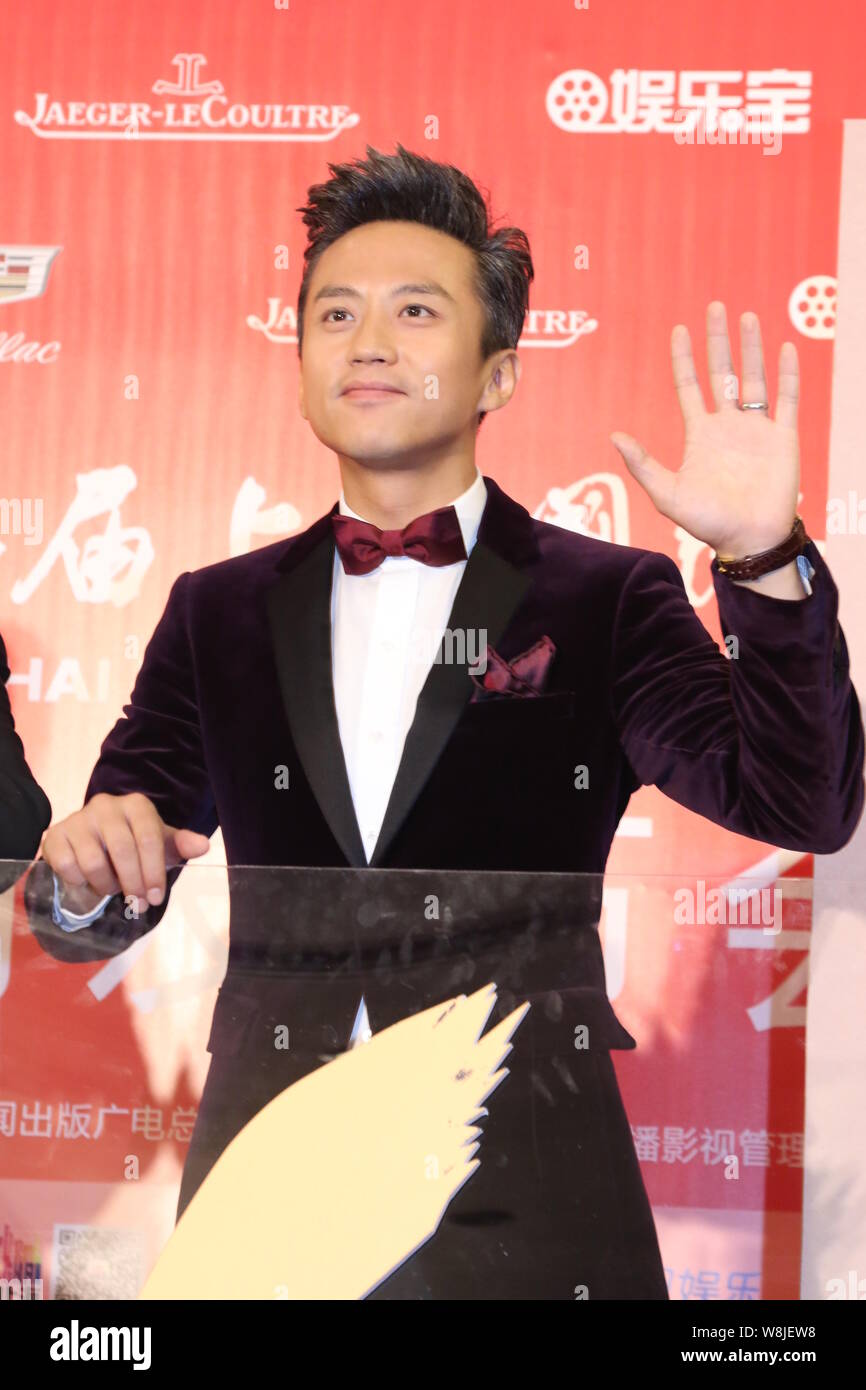 Chinese actor Deng Chao waves at a press conference for his movie "The ...
