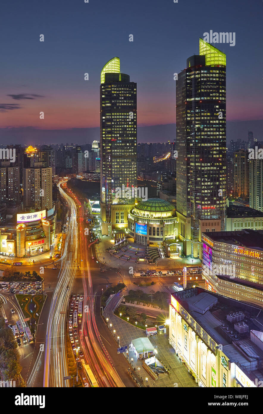 Night view of busy streets, the skyscrapers of Grand Gateway, tallest ...