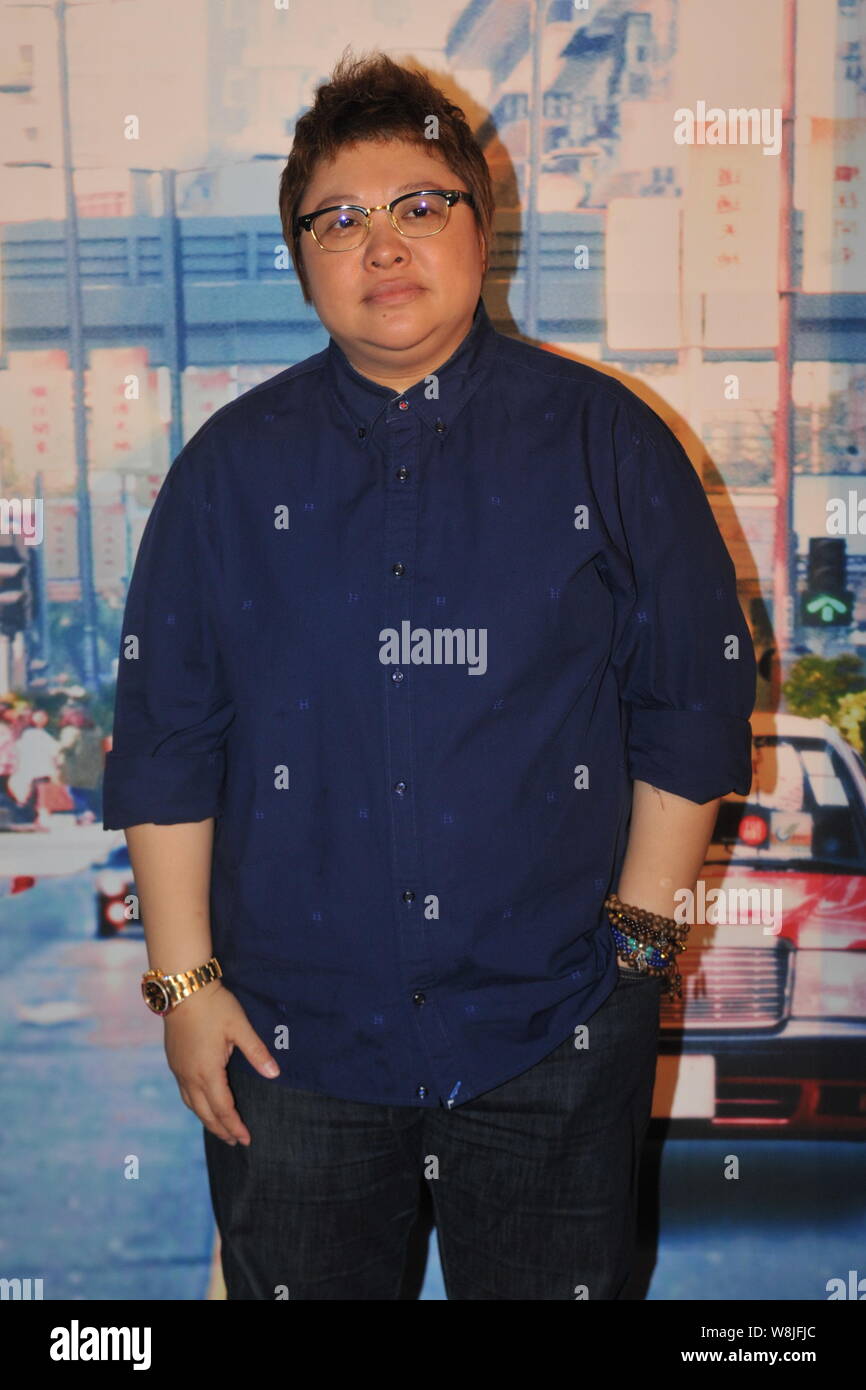 Chinese singer Han Hong poses on the red carpet as she arrives for the ...