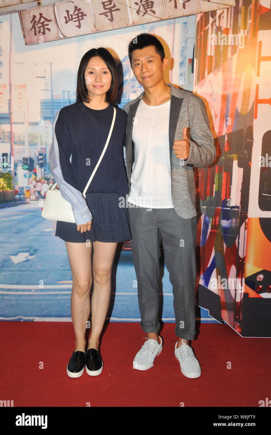 Chinese actor Xia Yu, right, and his actress wife Yuan Quan pose on the ...