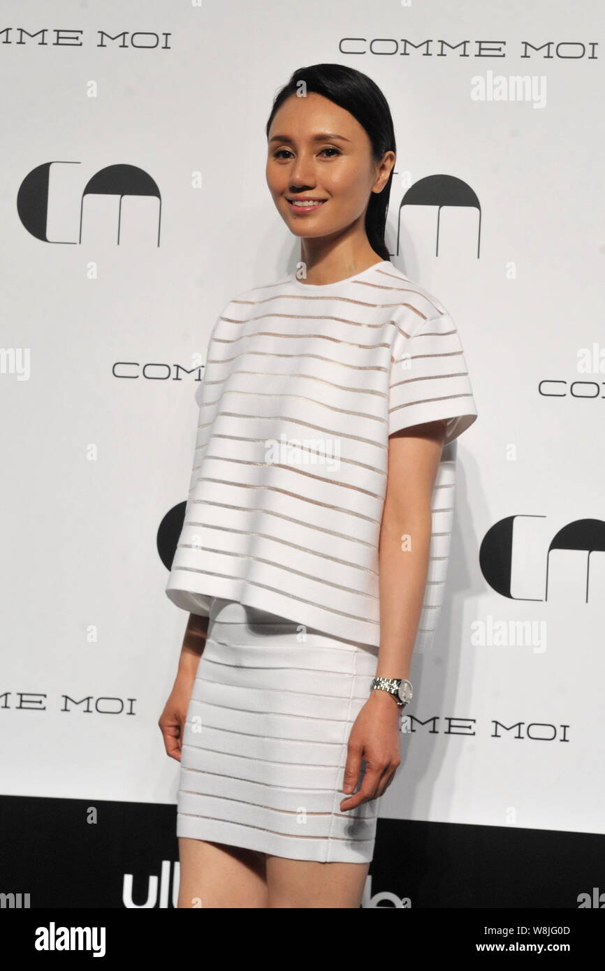Chinese actress Yuan Quan poses during the Comme Moi fashion show by ...