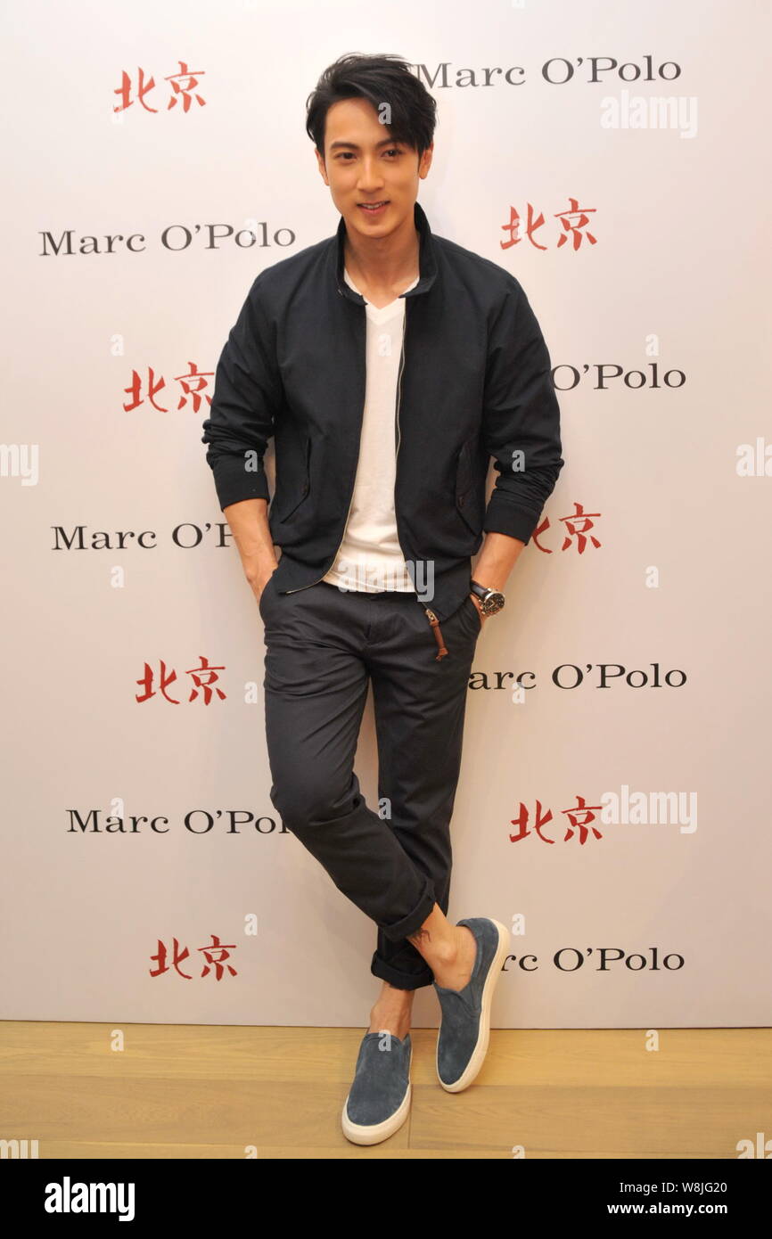 Bruneian singer and actor Wu Chun poses during the opening ceremony for ...