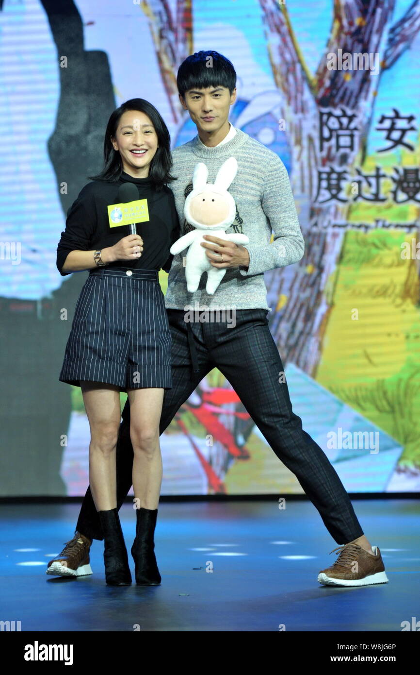 Chinese movie producer Zhou Xun, left, and Chinese actor Liu Chang smile during a press ...
