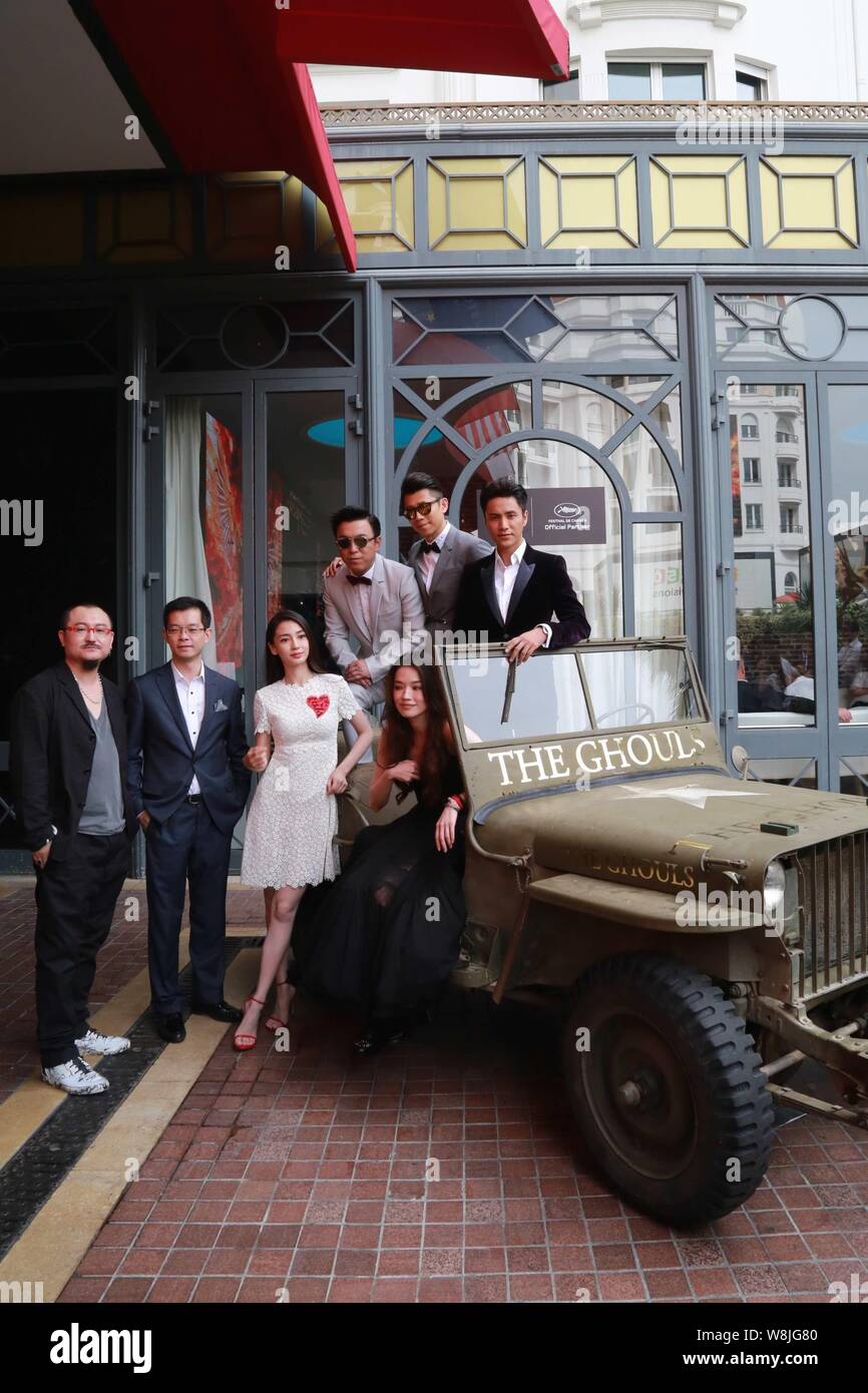 Cast members pose at a photocall for their movie "The Ghouls" during ...