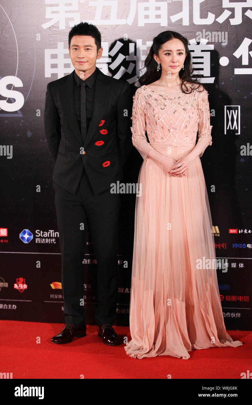Chinese actress Yang Mi, right, and actor Huang Xiaoming pose at the ...