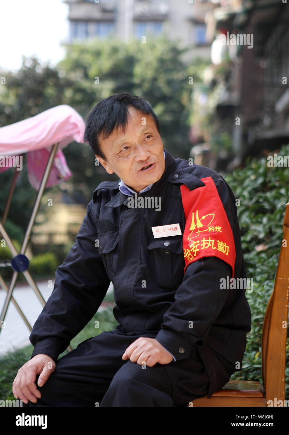 Chinese security guard hi-res stock photography and images - Alamy