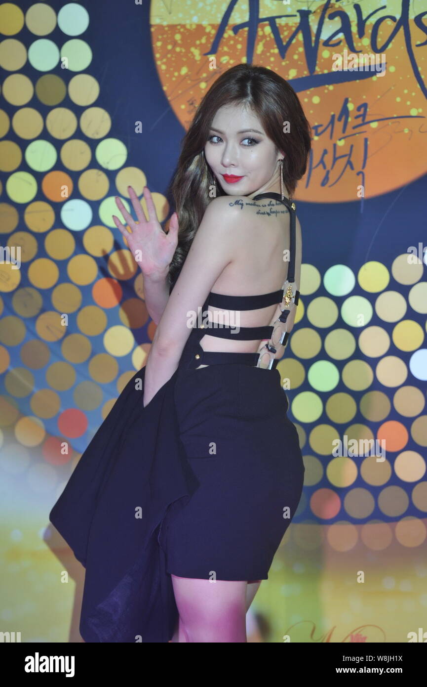 South Korean singer Kim Hyun-a (Hyuna) poses on the red carpet as she ...