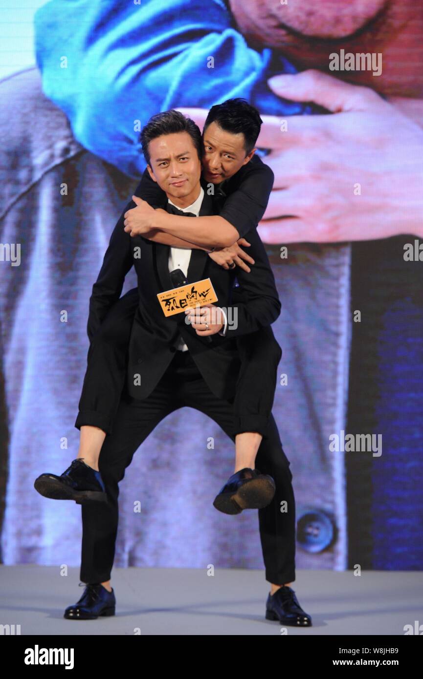 Chinese actors Deng Chao, front, and Duan Yihong attend a press ...