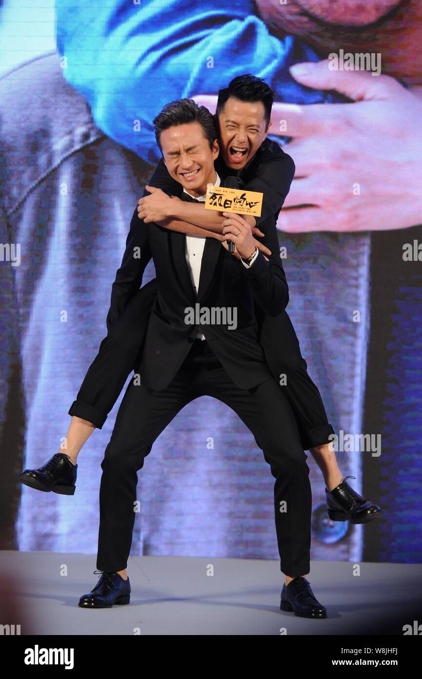 Chinese actors Deng Chao, front, and Duan Yihong attend a press ...