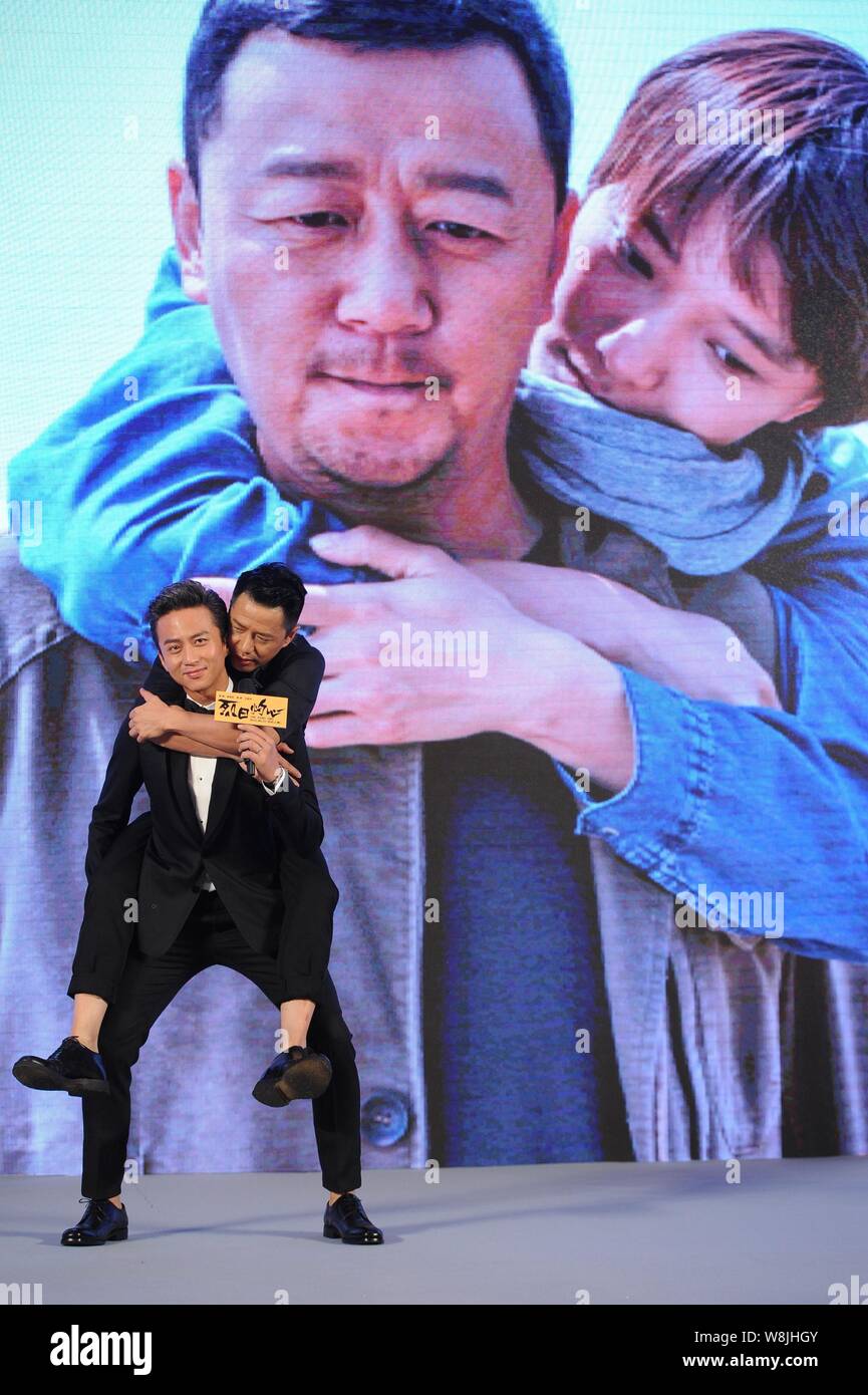 Chinese actors Deng Chao, front, and Duan Yihong attend a press ...