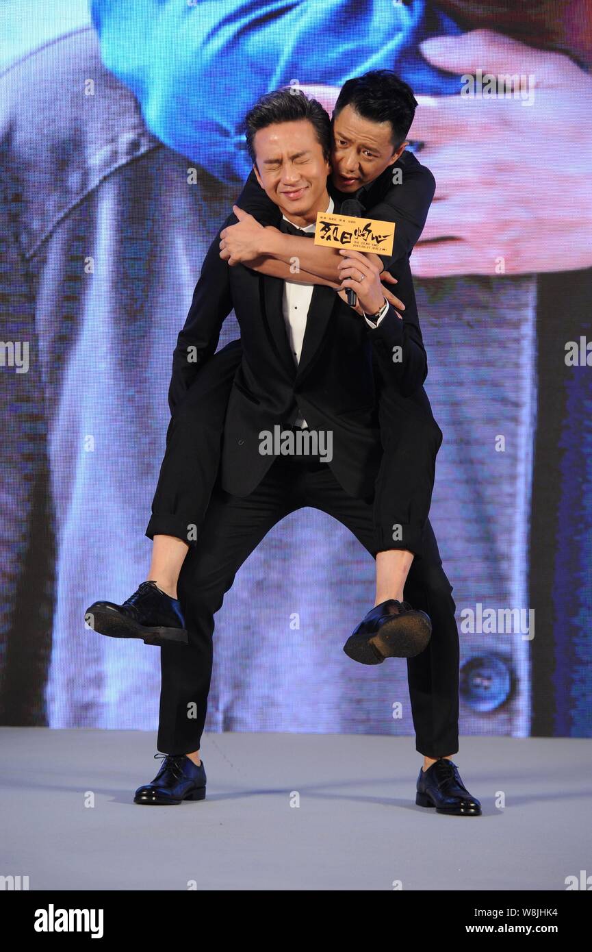 Chinese actors Deng Chao, front, and Duan Yihong attend a press ...