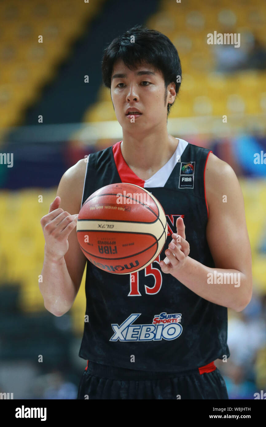 Joji Takeuchi of Japan reacts in a second round group match against Palestine in a second round ...