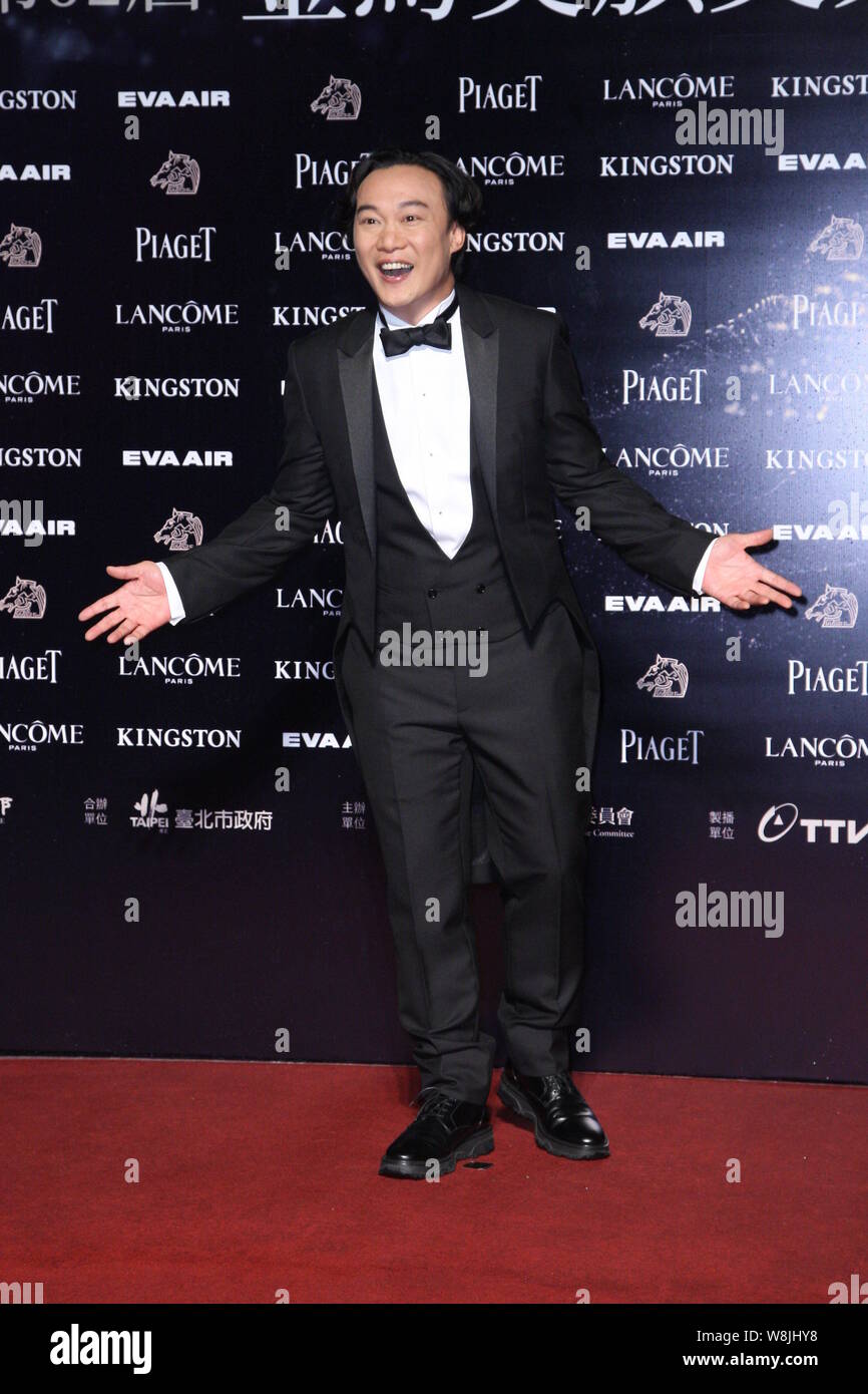 Hong Kong singer Eason Chan arrives on the red carpet for the 52nd ...