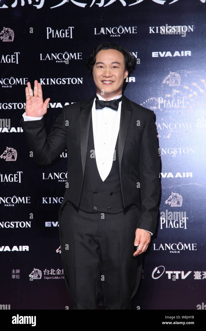 Hong Kong singer Eason Chan arrives on the red carpet for the 52nd ...