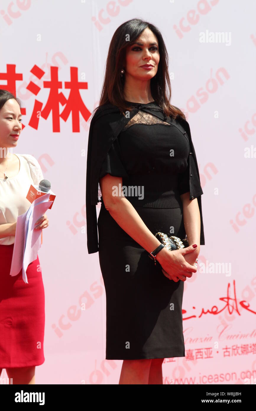 Italian actress Maria Grazia Cucinotta poses at a signing ceremony to ...