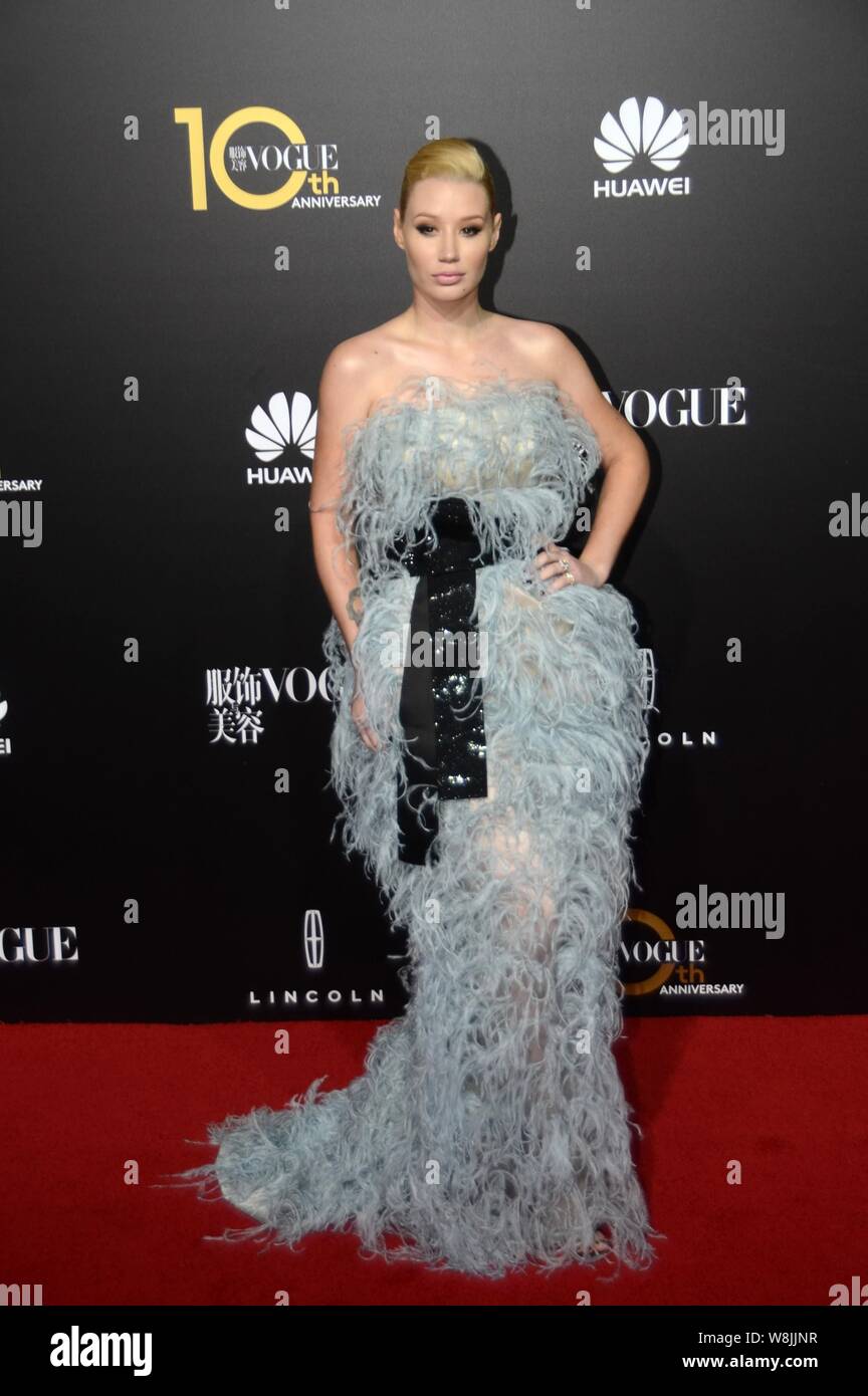 Australian rapper Iggy Azalea poses on the red carpet of the 10th ...