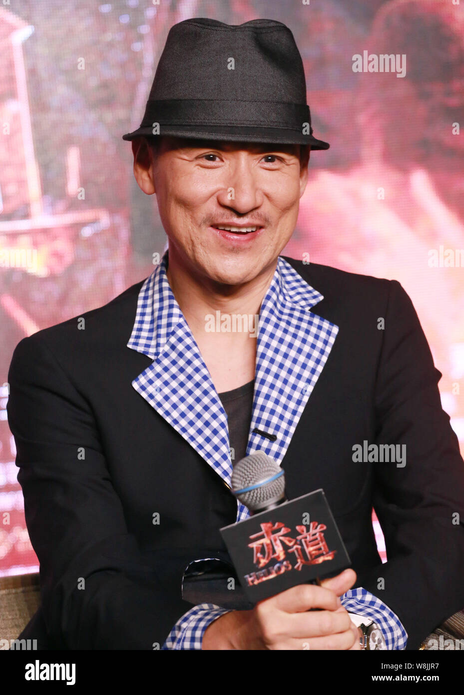 Hong Kong singer and actor Jacky Cheung reacts during a press ...