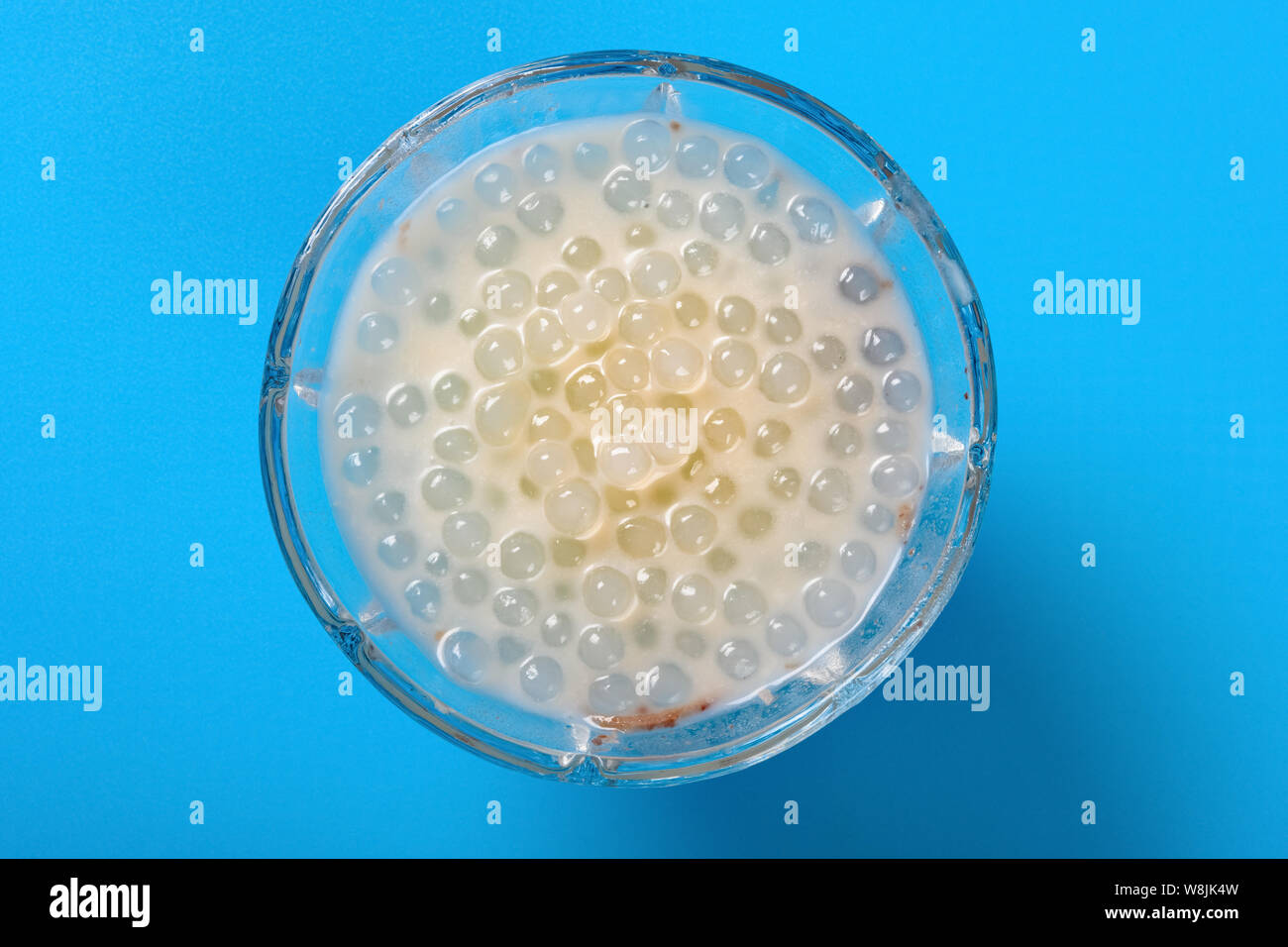 top view bowl of Chinese syrup of sago on blue background Stock Photo ...