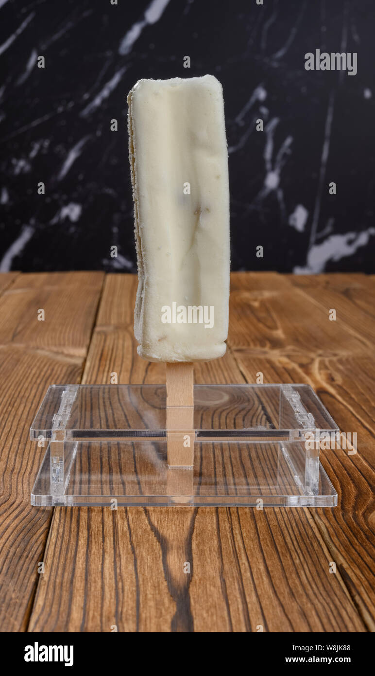 popsicle with green bean inside on a wood table Stock Photo - Alamy