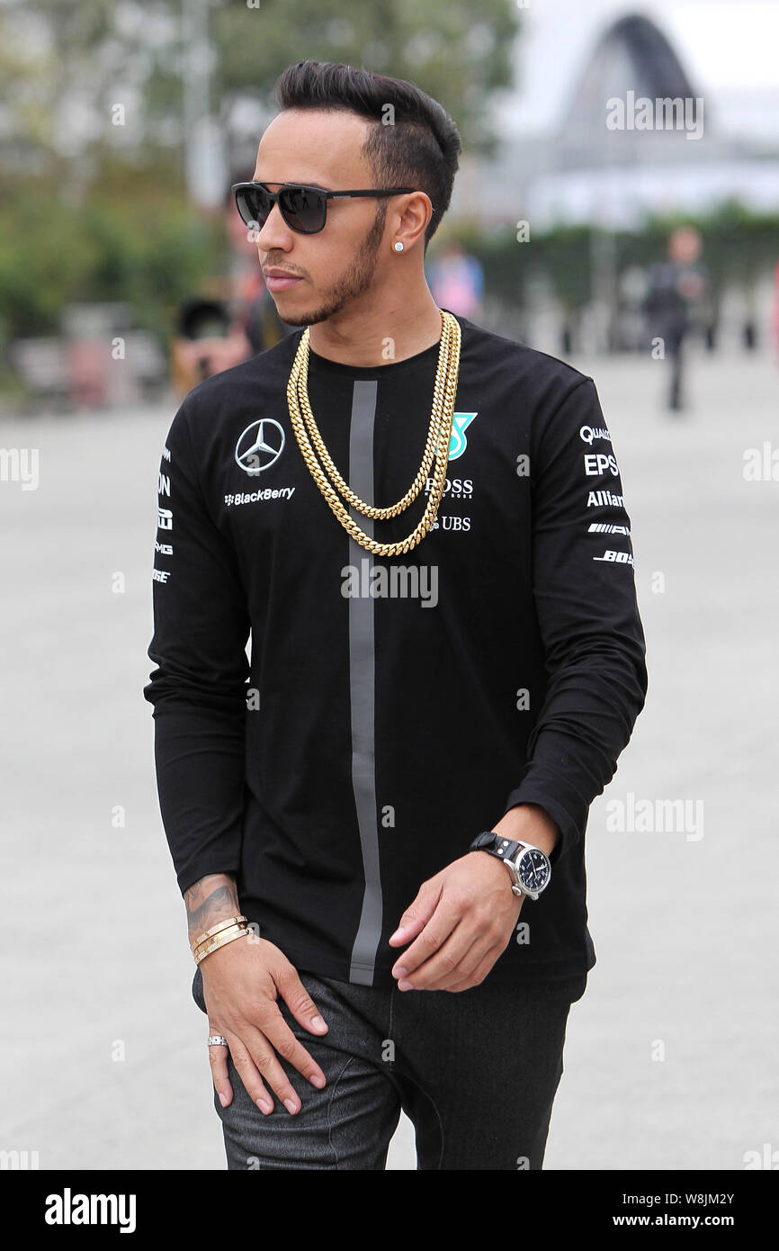 British F1 driver Lewis Hamilton of Mercedes arrives at the Shanghai ...