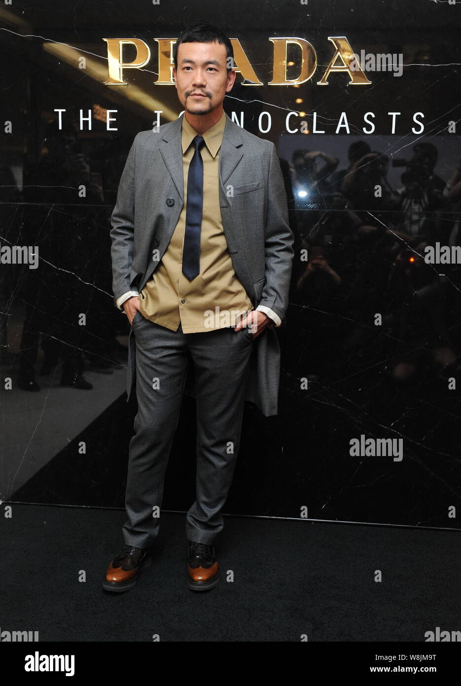 Chinese actor Liao Fan poses during the opening ceremony for the Prada ...