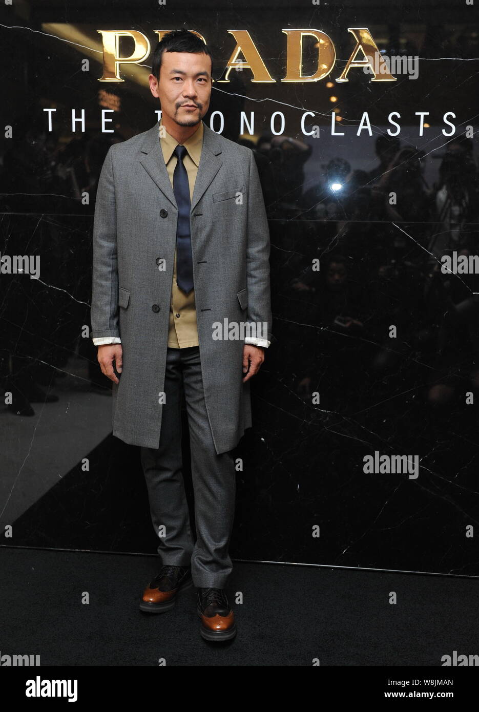 Chinese actor Liao Fan poses during the opening ceremony for the Prada ...