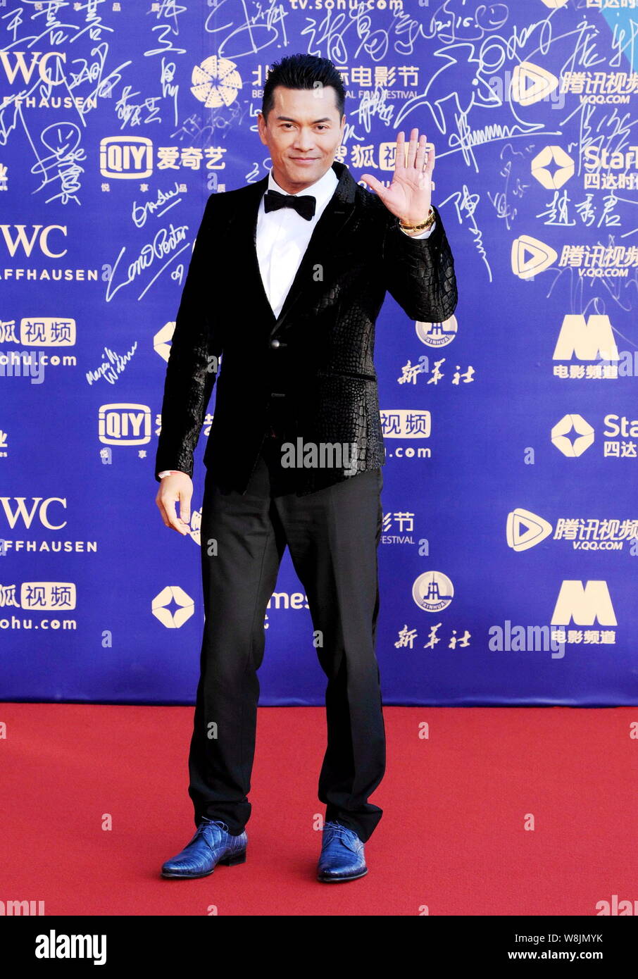 Hong Kong actor Ray Lui poses on the red carpet for the opening ...