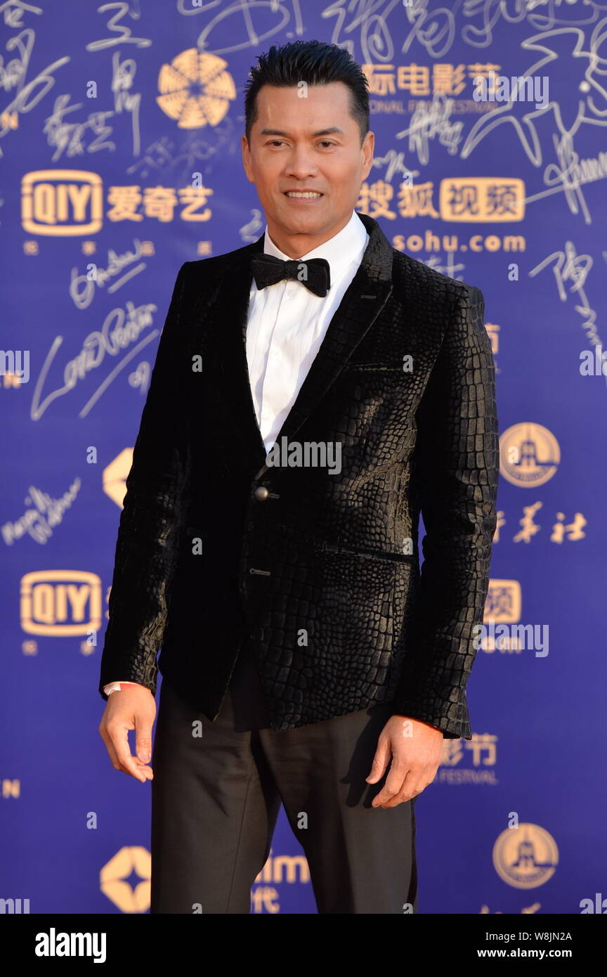 Hong Kong actor Ray Lui poses on the red carpet for the opening ...