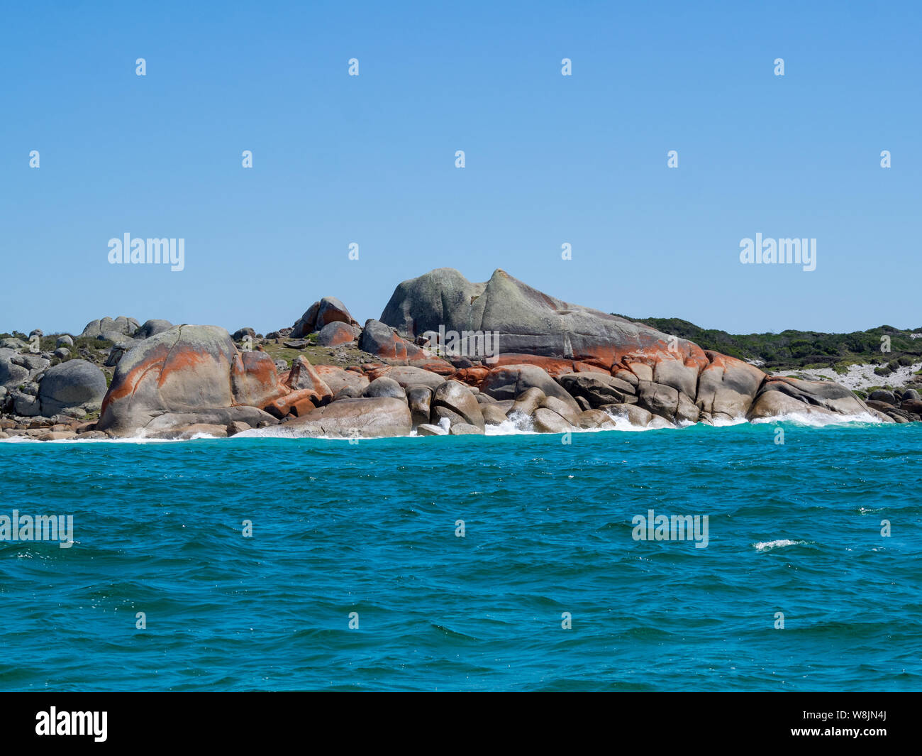Red lichen covered rocks of the Bay of Fires, Tasmania Stock Photo - Alamy