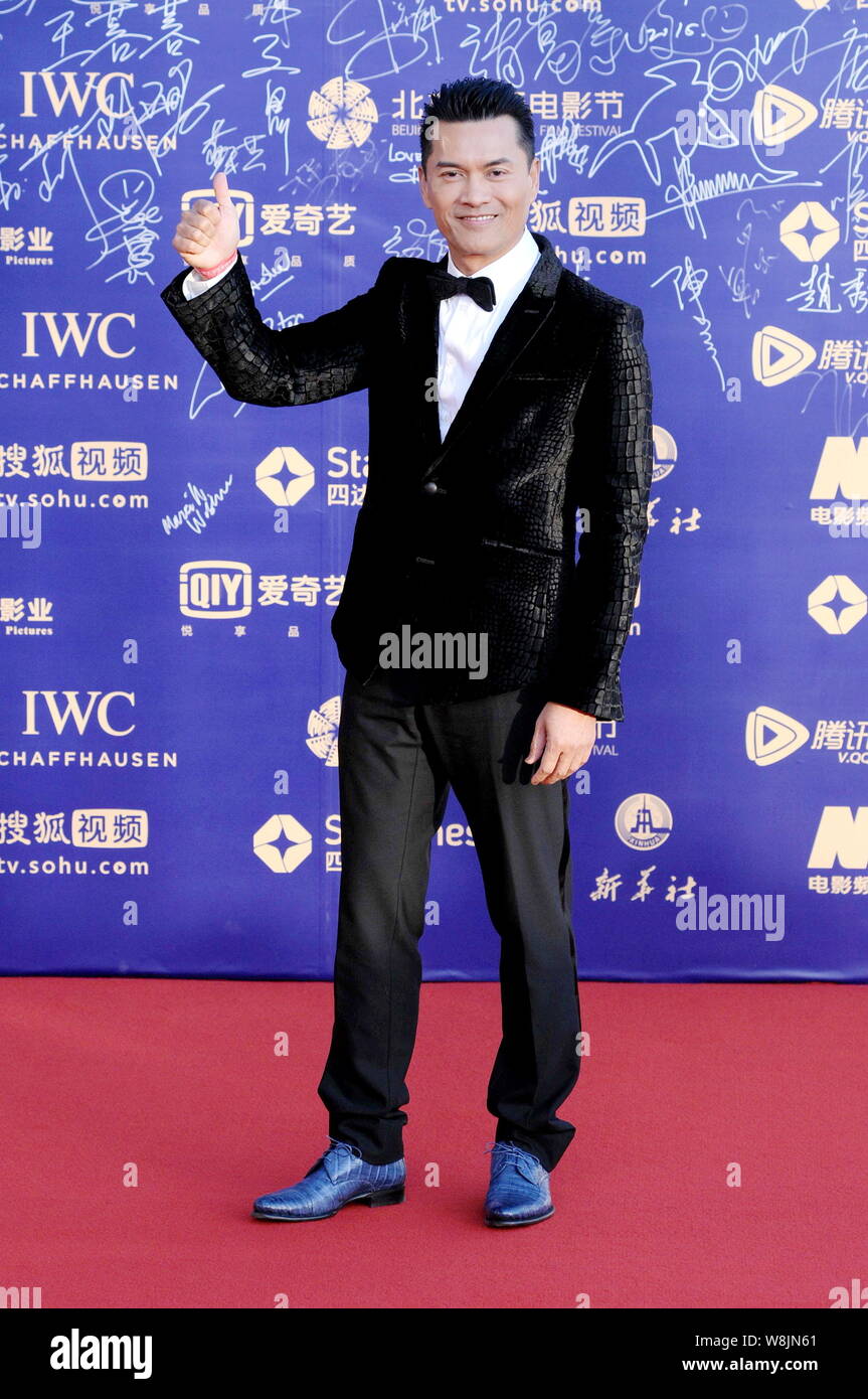 Hong Kong actor Ray Lui poses on the red carpet for the opening ...