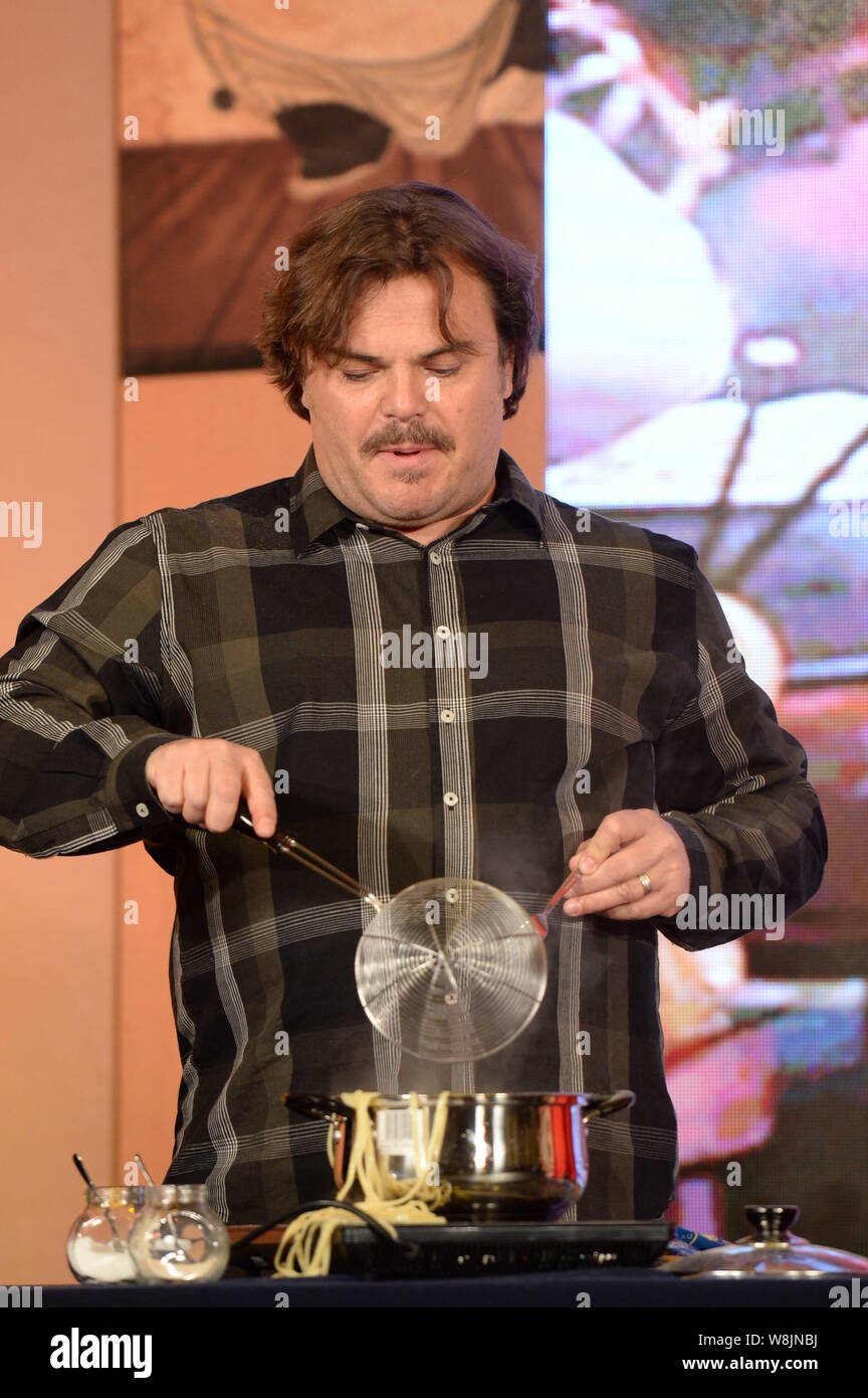 American actor Jack Black cooks noodles at a press conference for the ...