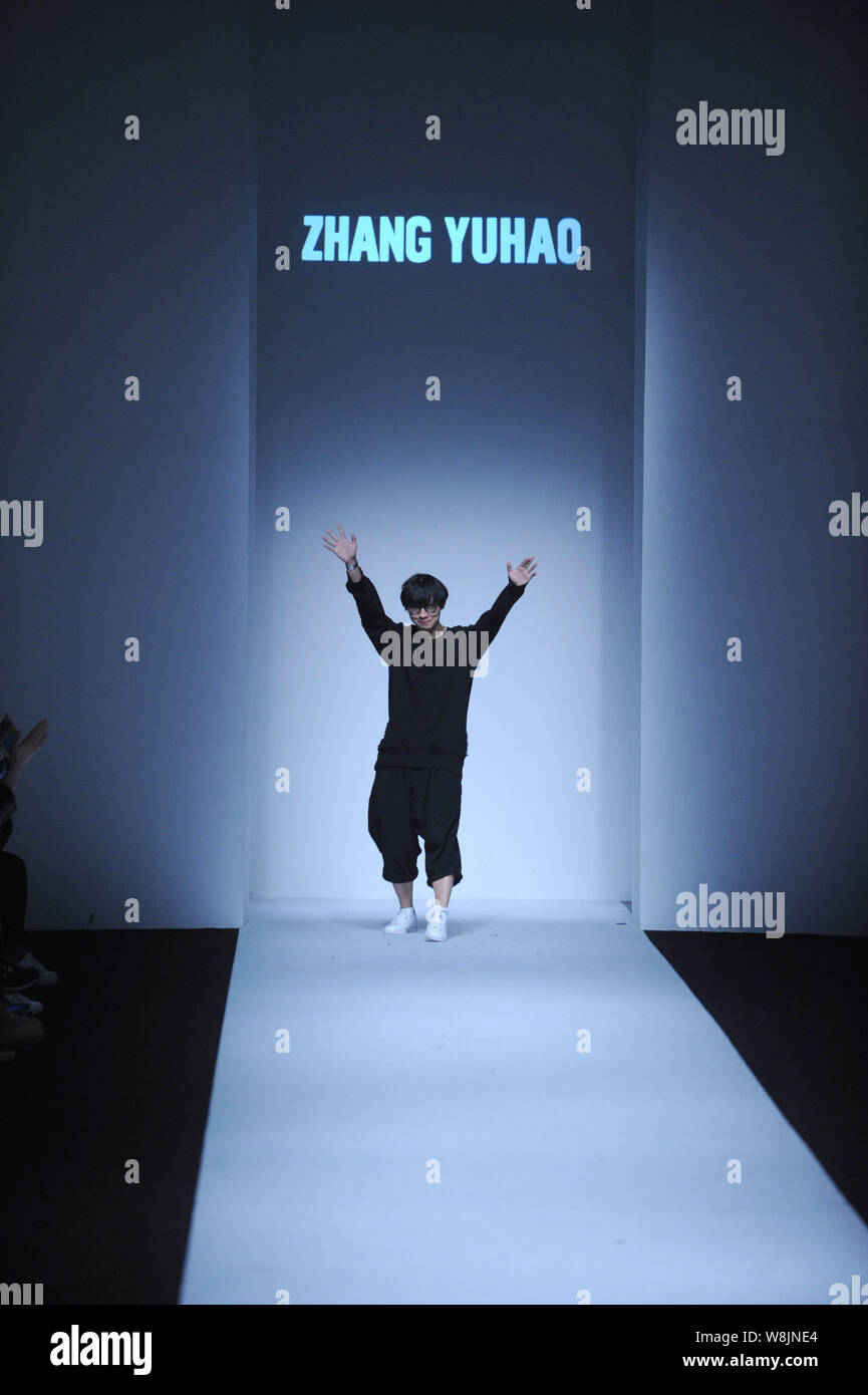 A model displays a new creation at the Zhang Yuhao fashion show during ...