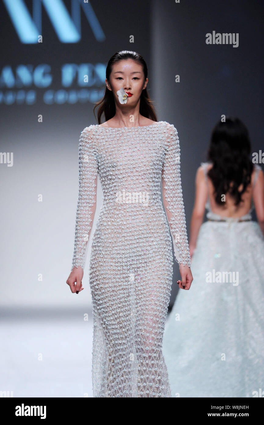 A model displays a new creation at the haute couture fashion show of ...