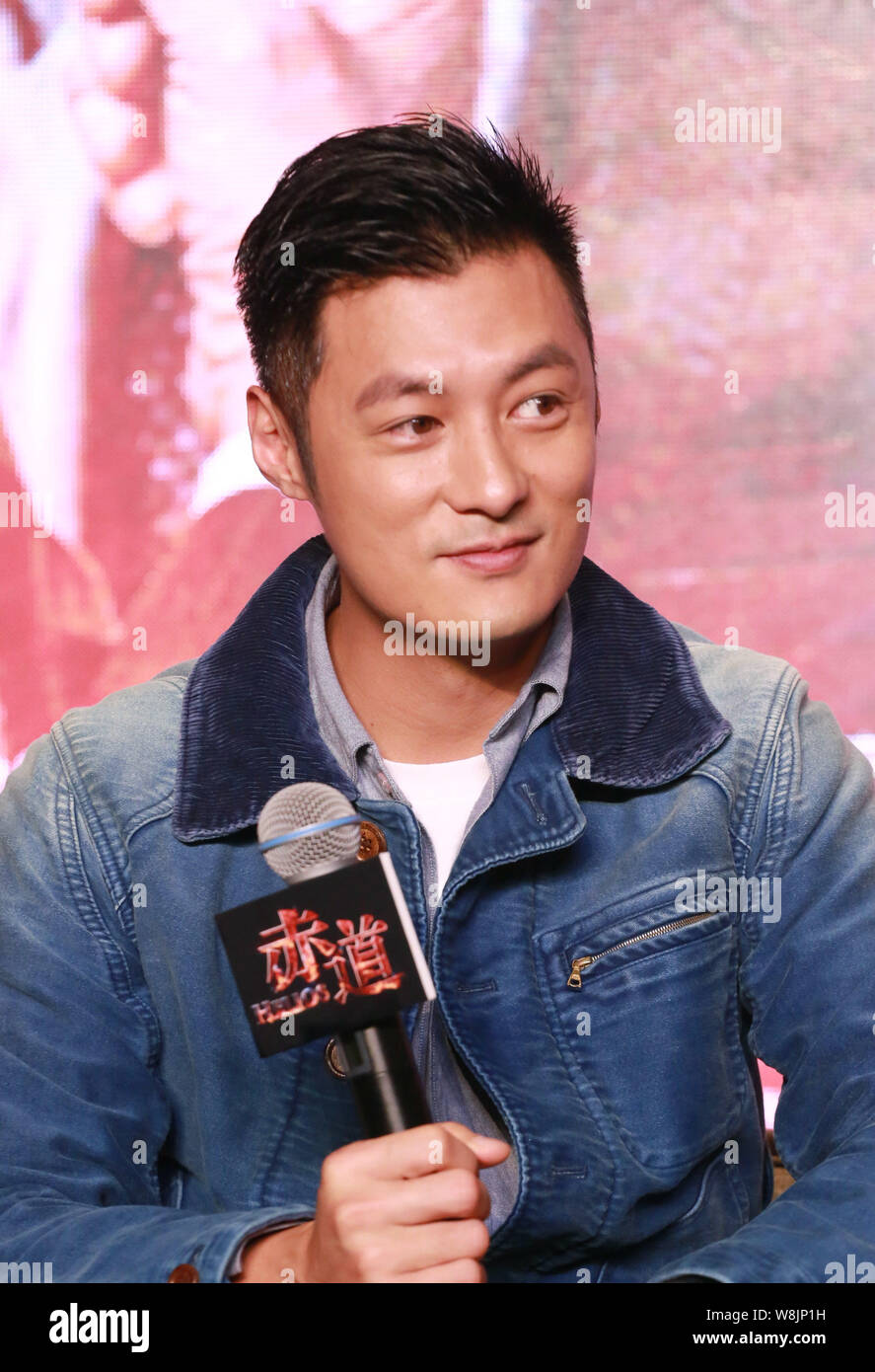 Hong Kong singer and actor Jacky Cheung listens during a press ...