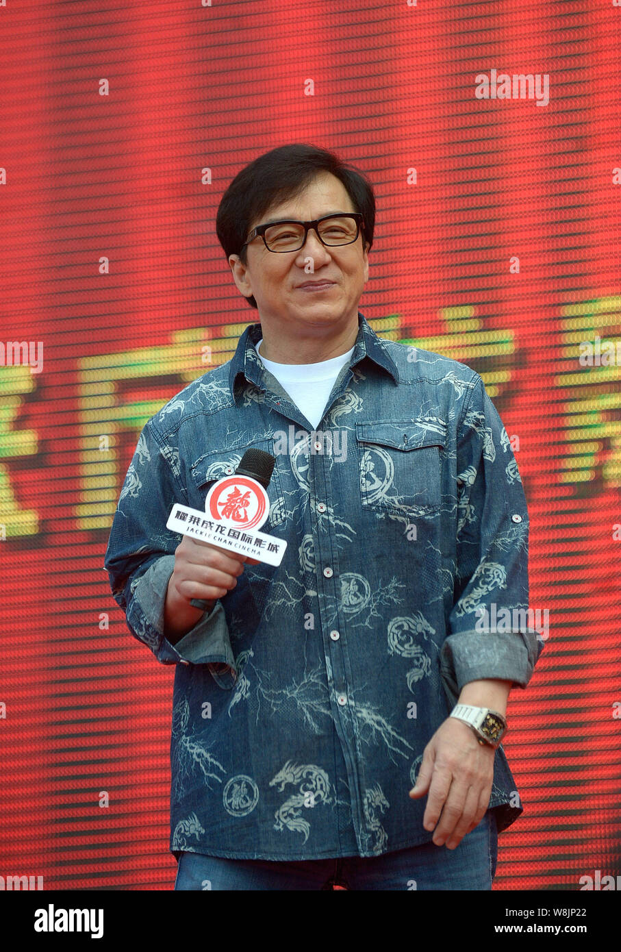 Hong Kong kungfu superstar Jackie Chan smiles during a fan meeting for ...