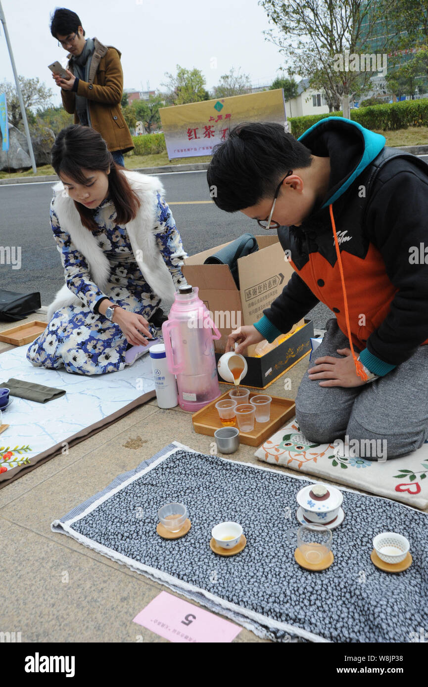 Chinese beauties perform teaism on a street in Yingde city, south China ...