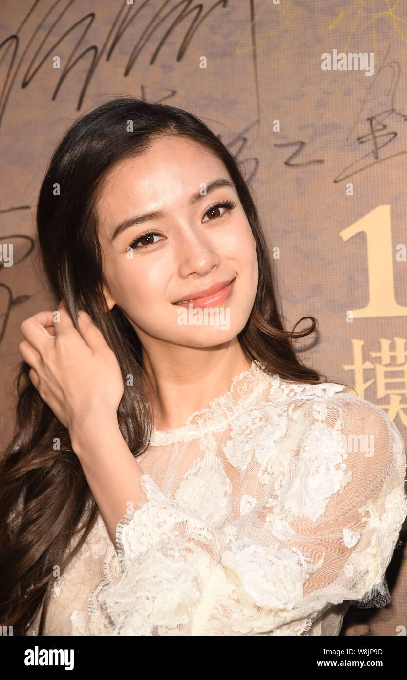 Hong Kong model and actress Angelababy poses on the red carpet for the ...