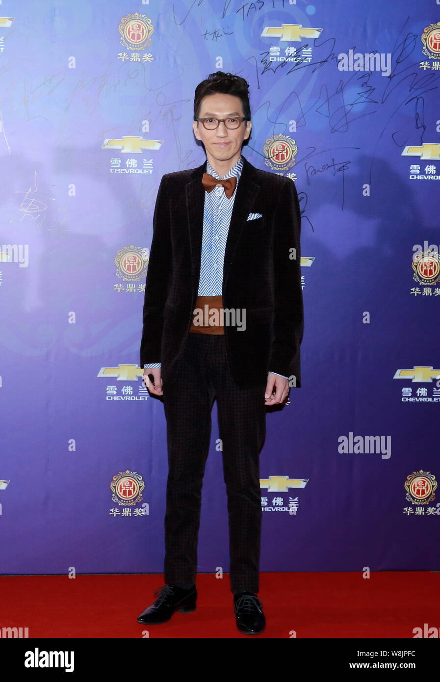 Taiwanese singer Terry Lin poses on the red carpet as he arrives for ...