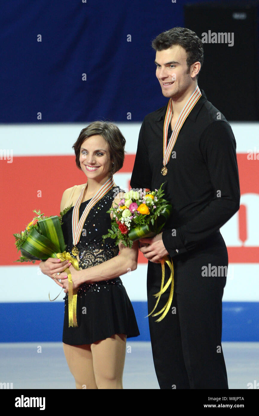 Meagan Duhamel, left, and Eric Radford of Canada pose after winning ...