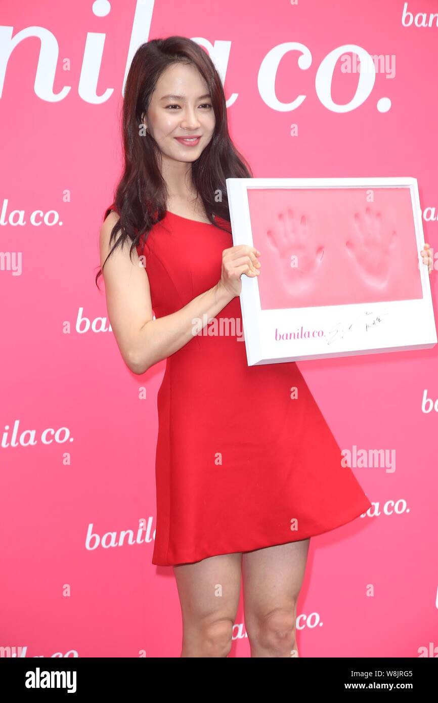 South Korean actress Song Ji-hyo shows her handprints during a ...